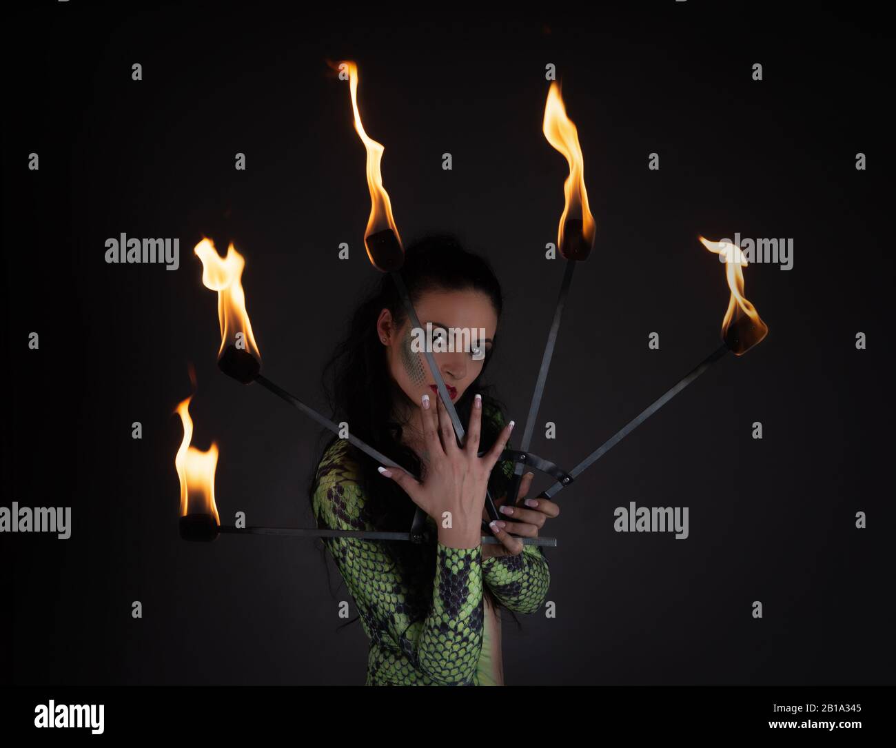 juggler girl performing fire games with python snake dress Stock Photo ...