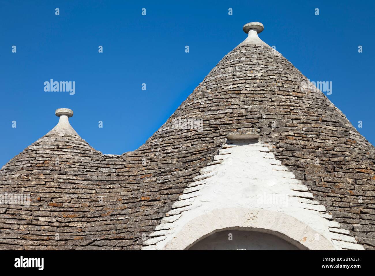 Typical trulli buildings with conical roofs in Alberobello, Apulia ...
