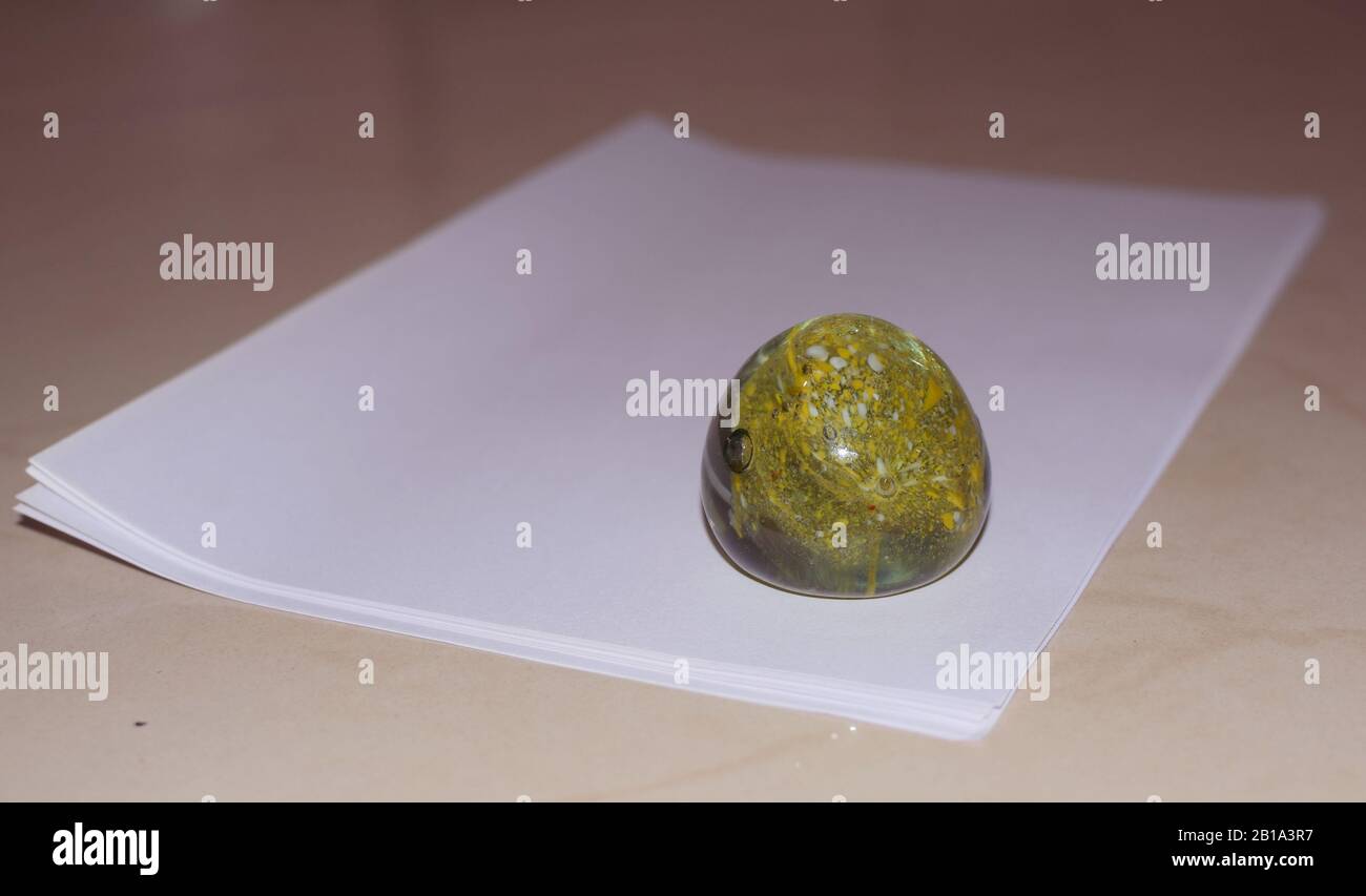 A glass paperweight in display Stock Photo - Alamy
