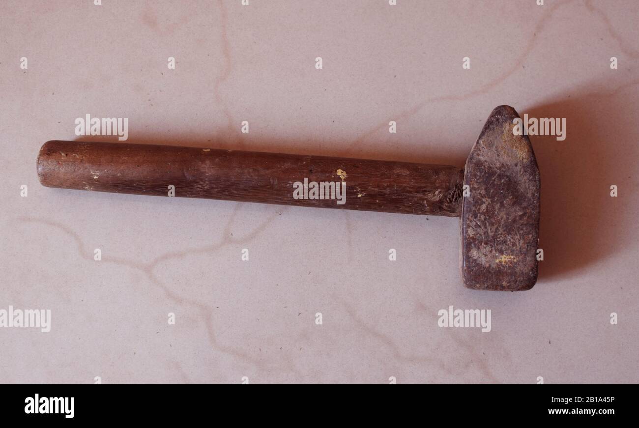 An old hammer lying in floor. It is also called as Hathoda in Hindi ...