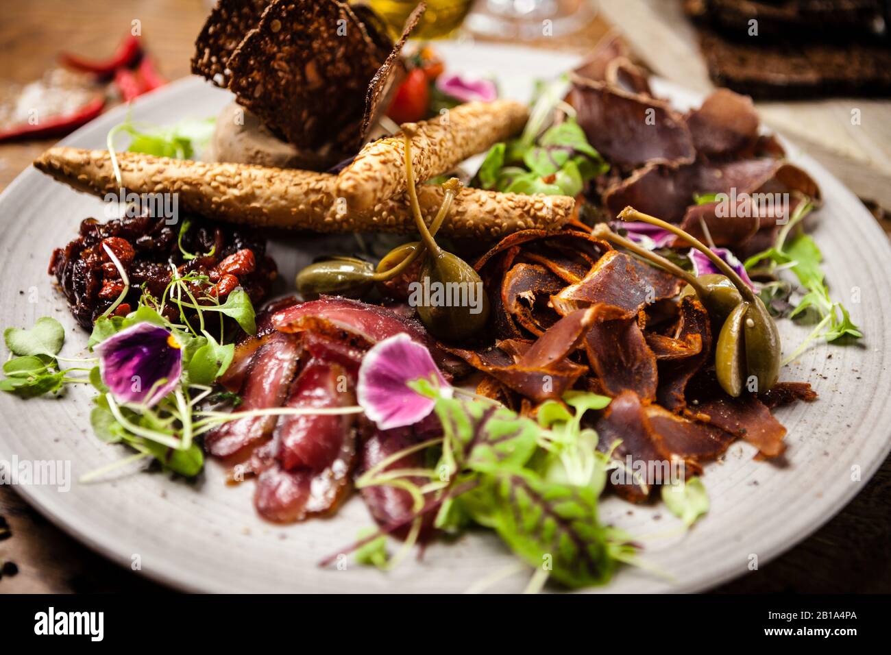 Meat platter for two served on a plate in restaurant Stock Photo - Alamy