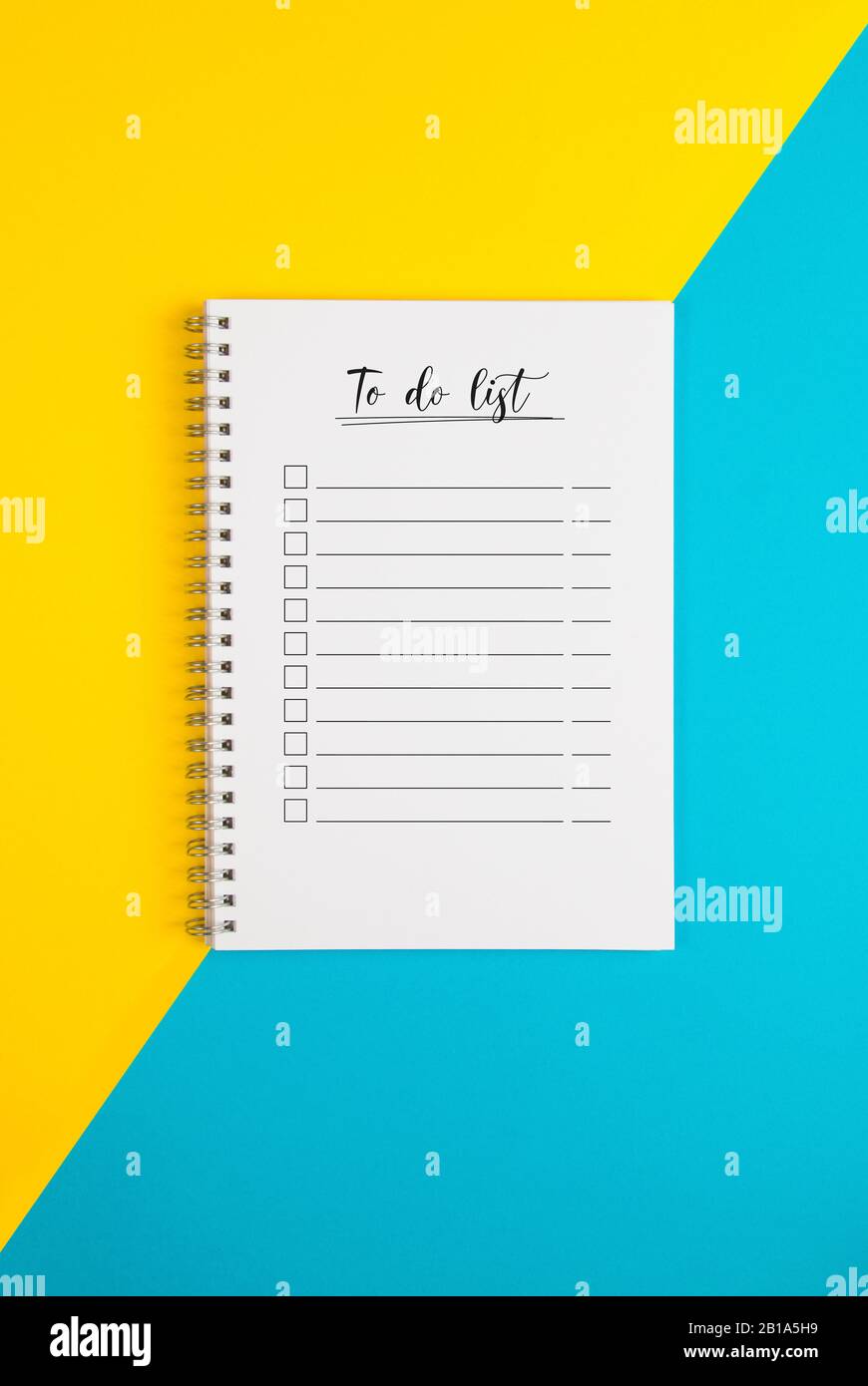 To do list on a yellow and blue background Stock Photo - Alamy