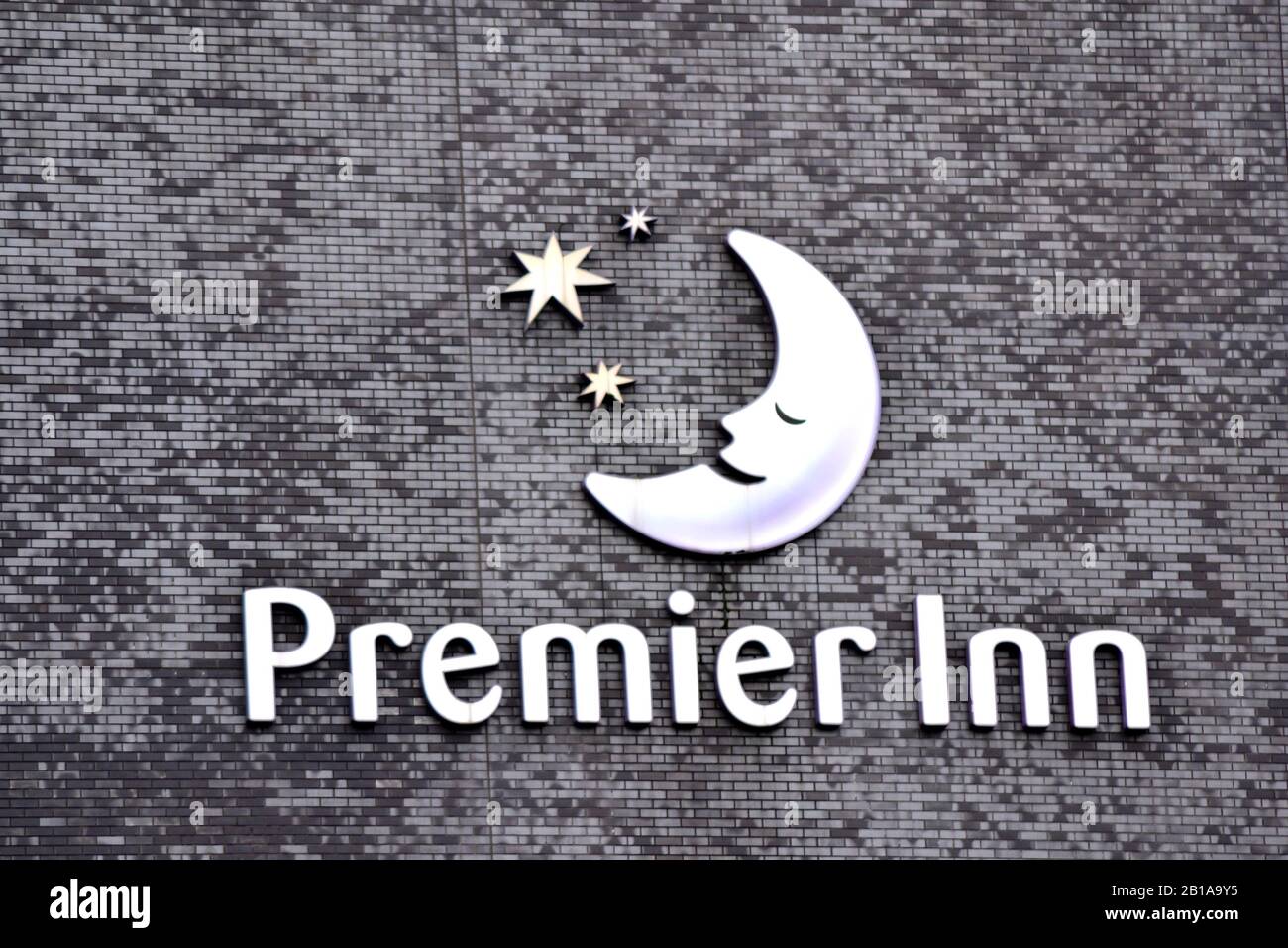 Sign on the wall of a Premier Inn hotel in city centre Manchester ...