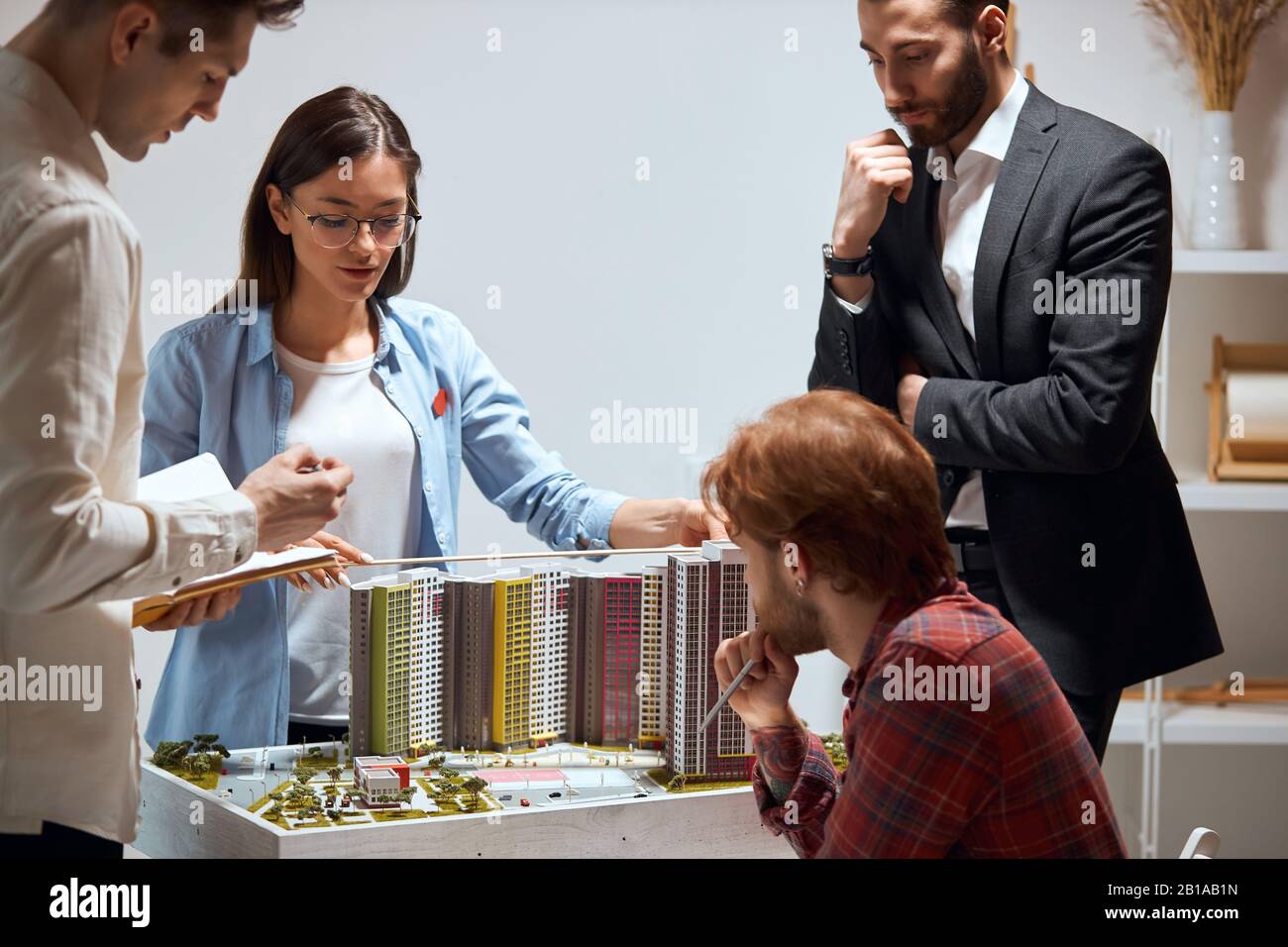 creative confident team of engineers working together in a architect ...