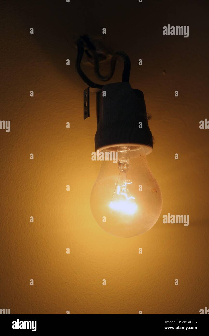 Old light bulb. Old wired light bulb. Vintage light bulb Stock Photo ...