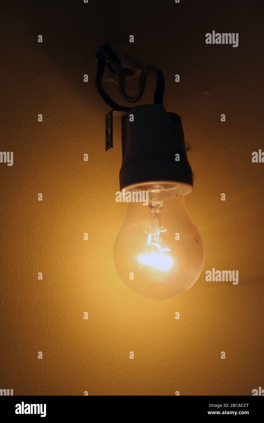 Old light bulb. Old wired light bulb. Vintage light bulb Stock Photo ...