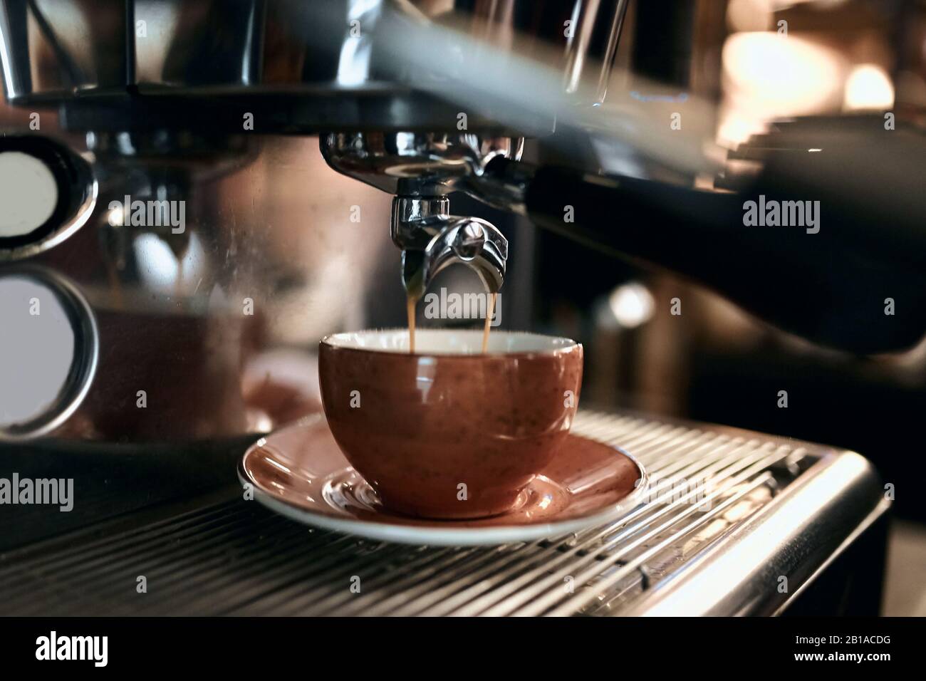preparation method. Modern coffee machine.man using professional ...