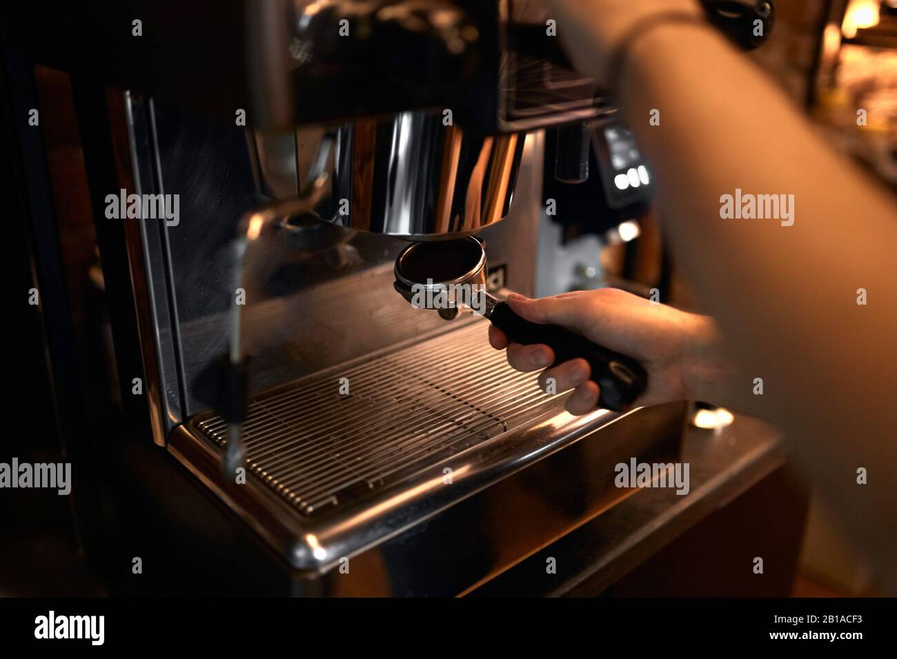 young guy using coffeemachine , close up cropped photo, first helper for housewife Stock Photo ...