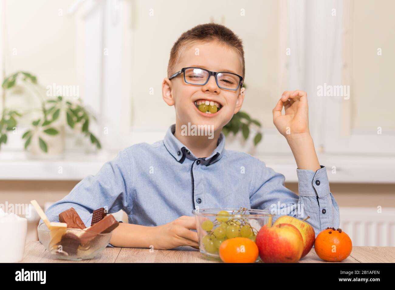 Boy chooses fruit hi-res stock photography and images - Alamy