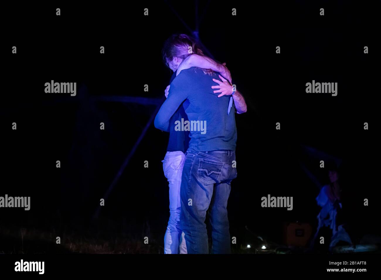 People hugging the earth hi-res stock photography and images - Alamy