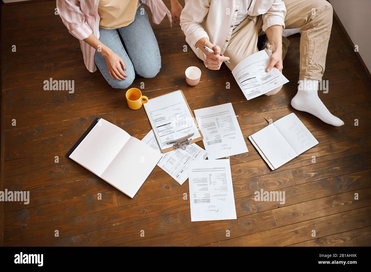 young people working with paper, document, cropped photo. family ...