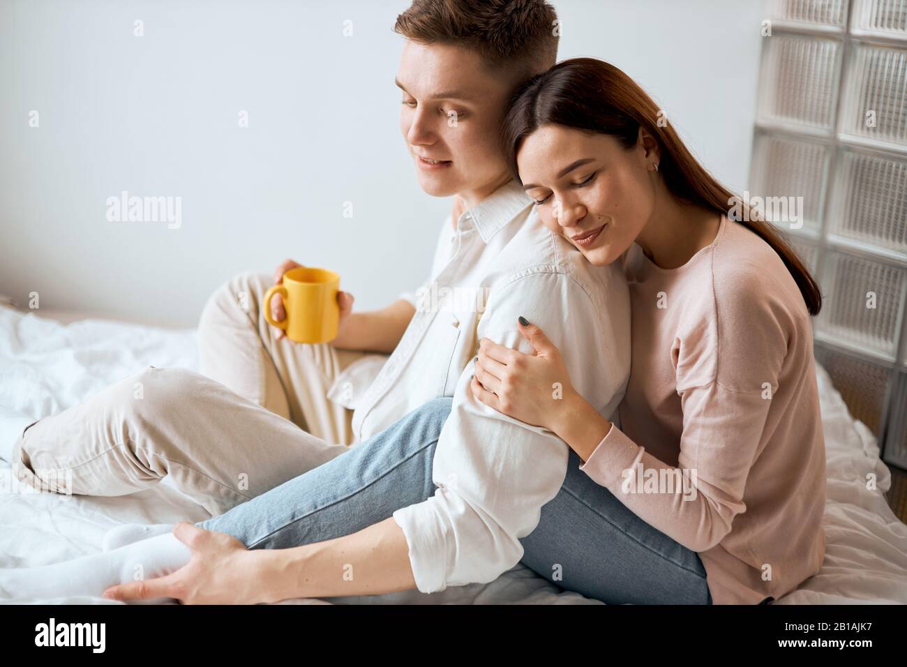 young people adore each other, romance concept, close up photo. strong ...