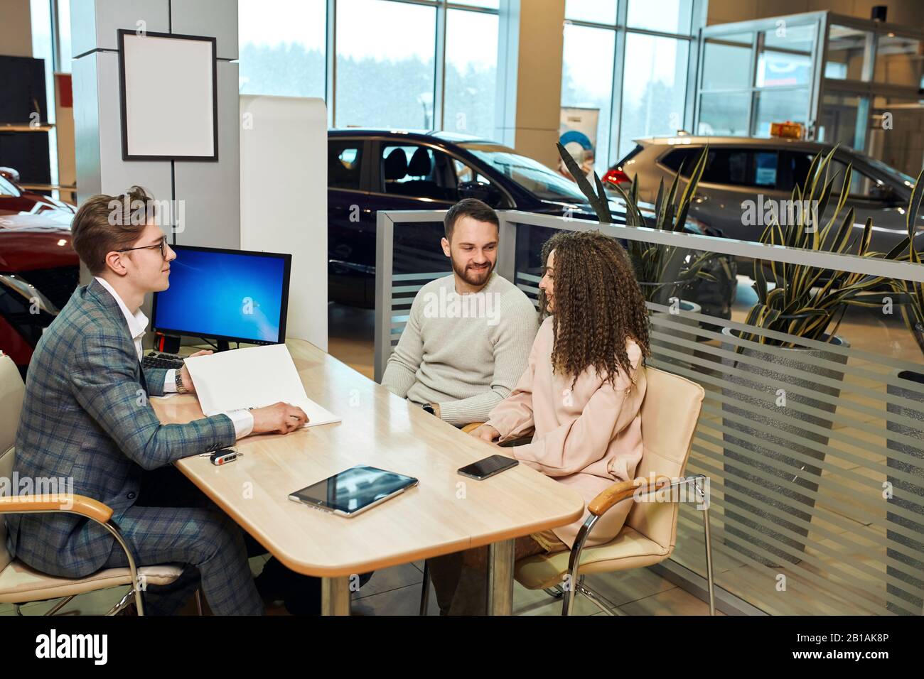 Car salesman sitting desk in hi-res stock photography and images - Alamy