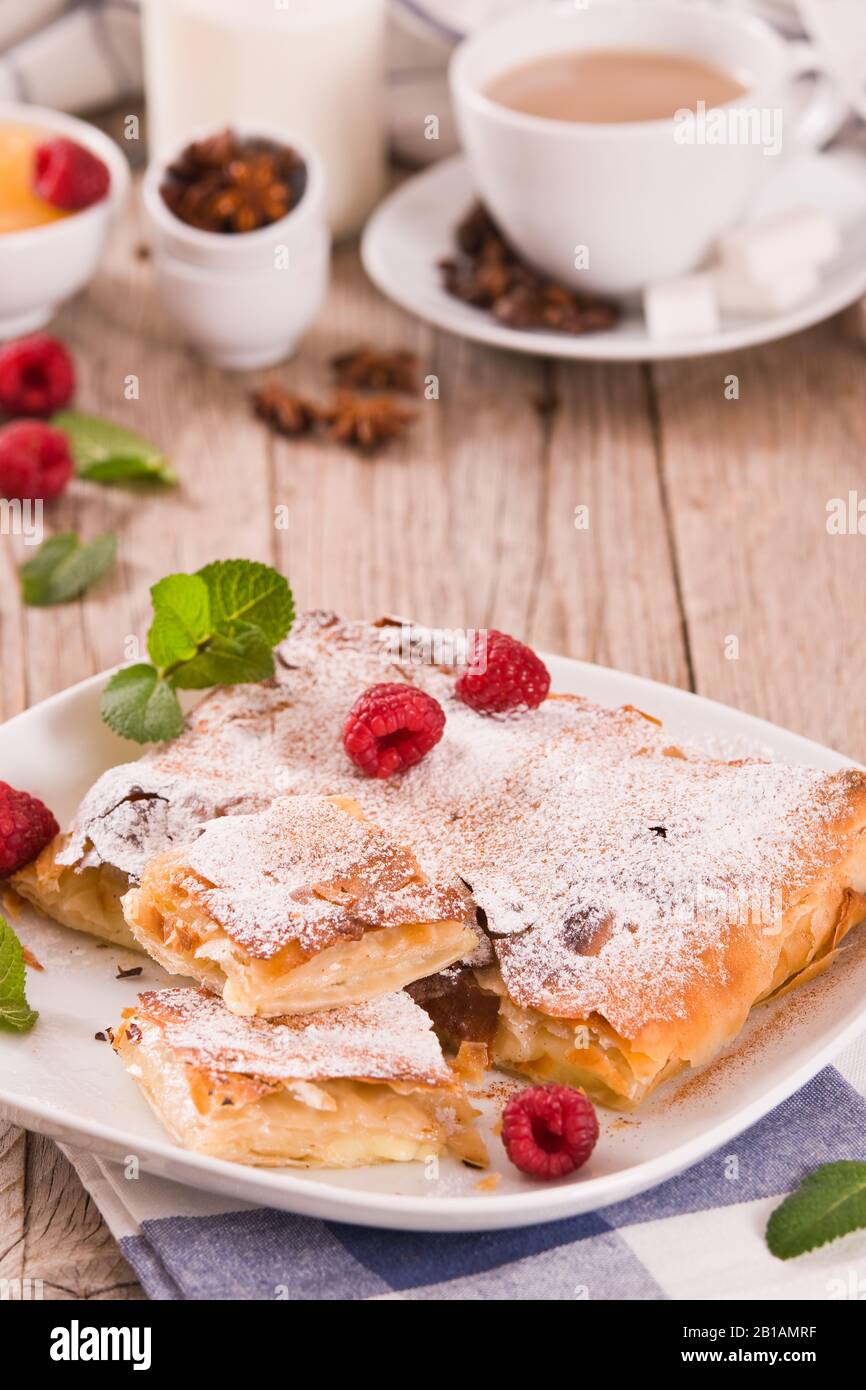 Bougatsa - Greek puff pastry with cream Stock Photo - Alamy