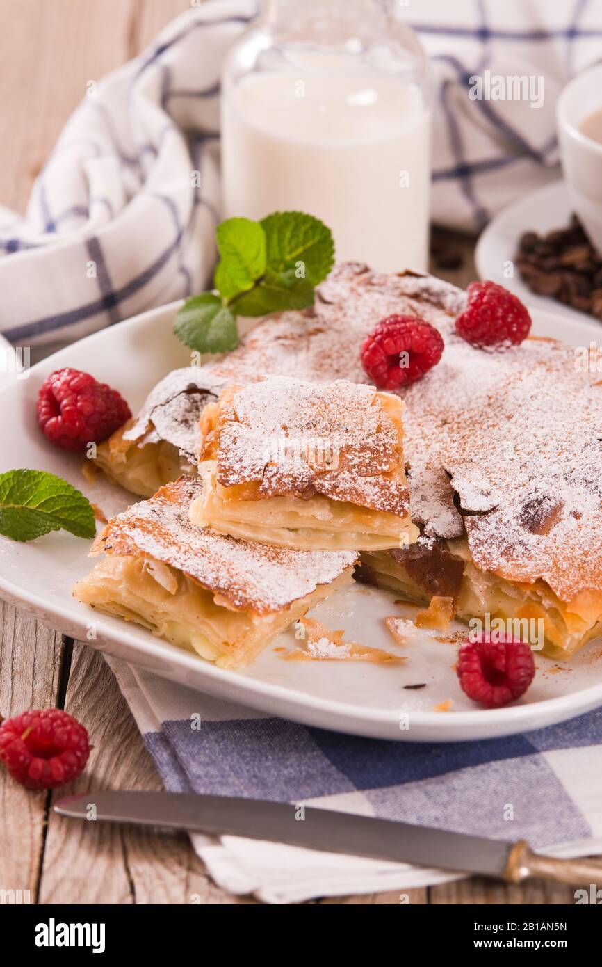 Bougatsa - Greek puff pastry with cream Stock Photo - Alamy