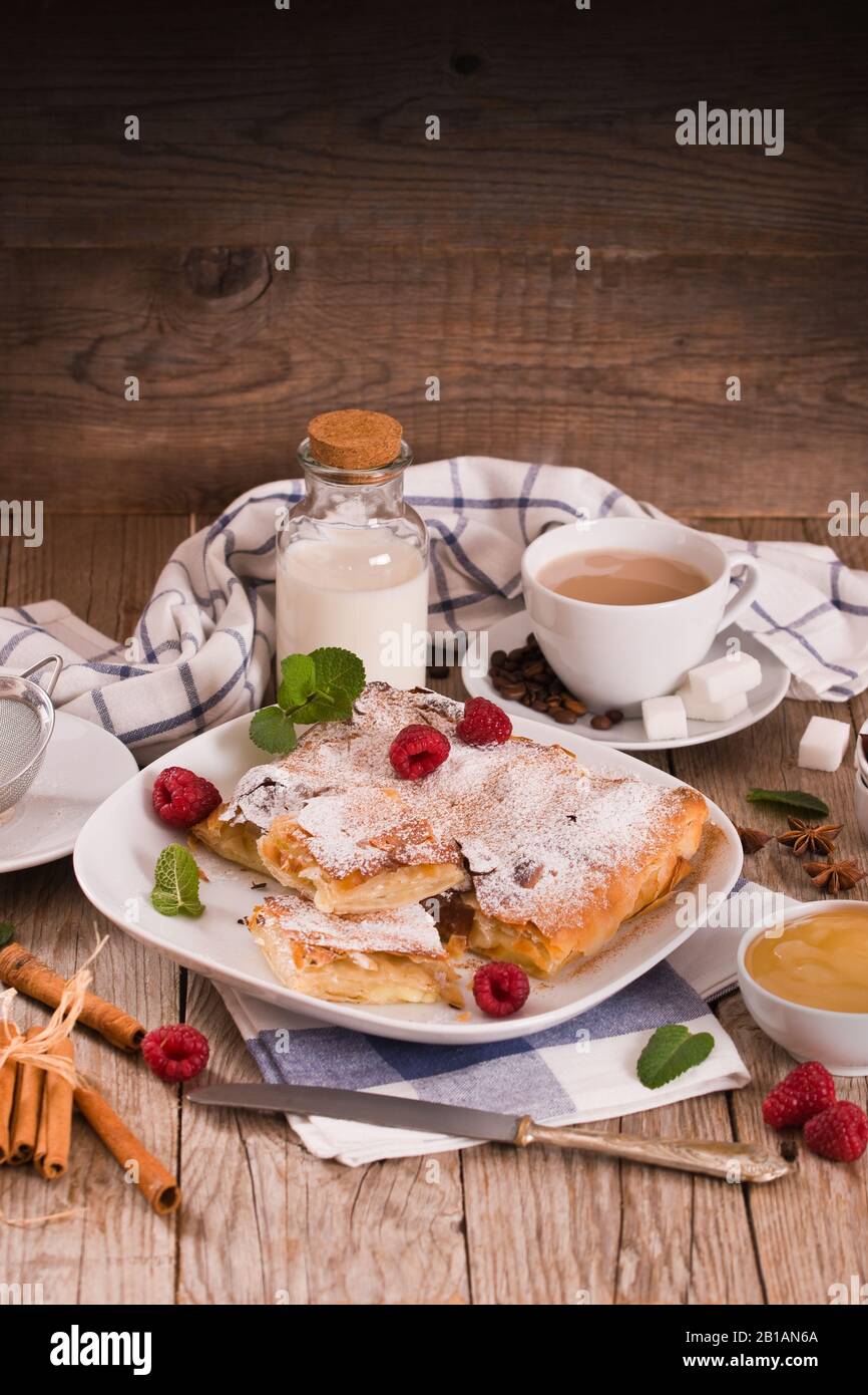 Bougatsa - Greek puff pastry with cream Stock Photo - Alamy