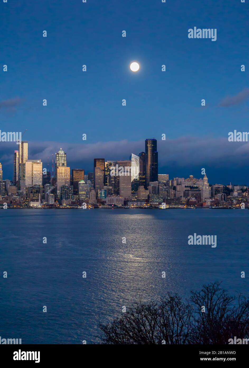 A bright full moon shines over the Seattle skyline Stock Photo - Alamy
