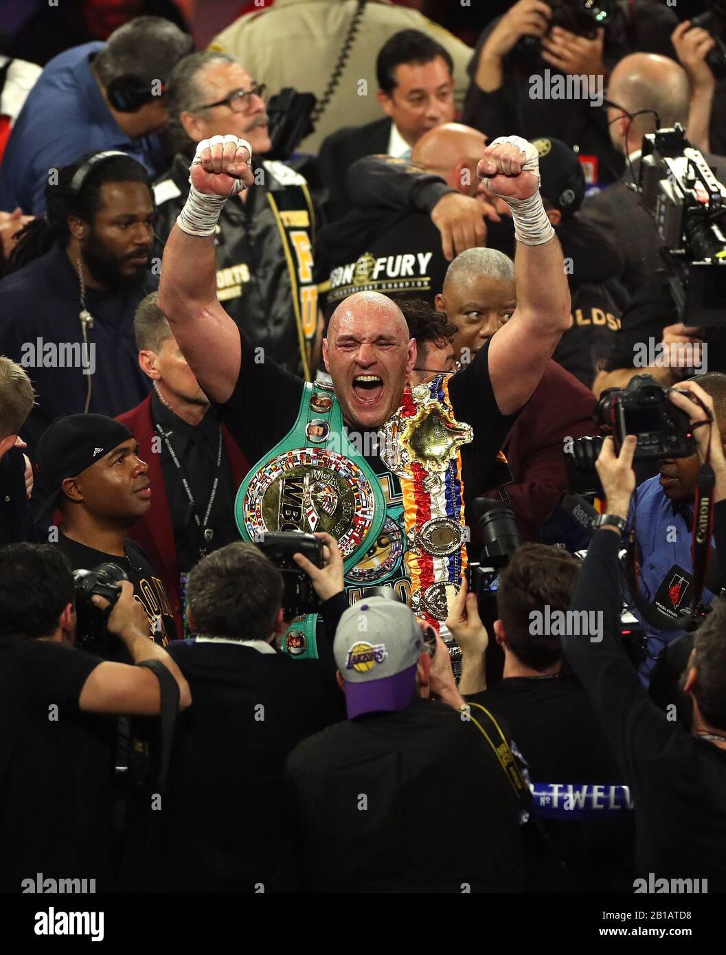 Tyson Fury celebrates victory after the World boxing Council World ...