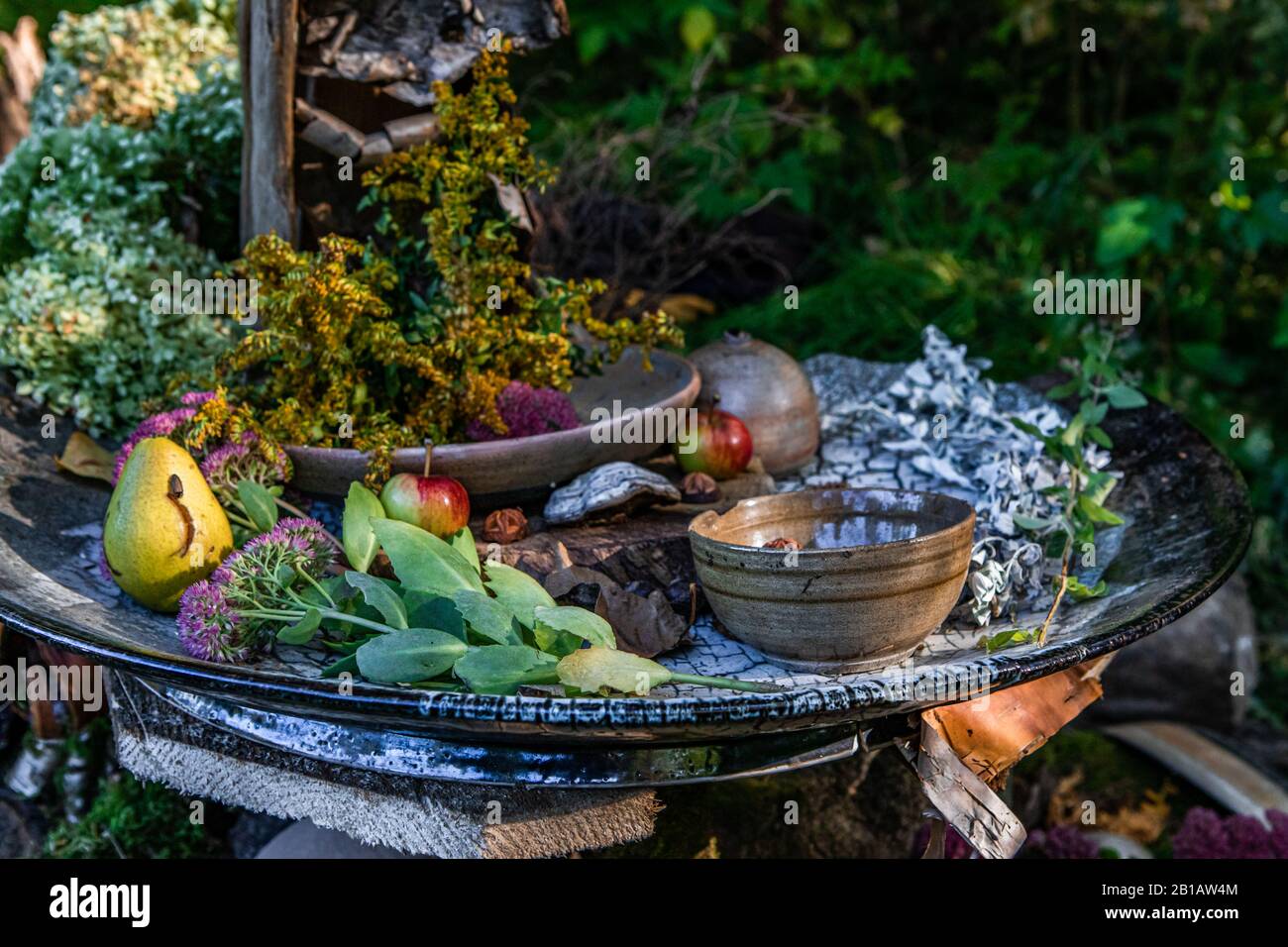 A close up shot with shallow depth of field of natural offerings on a ...