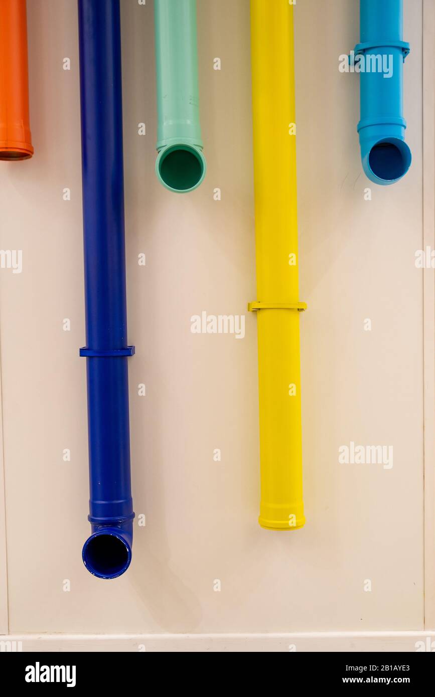 colorful pipes on the wall Stock Photo - Alamy
