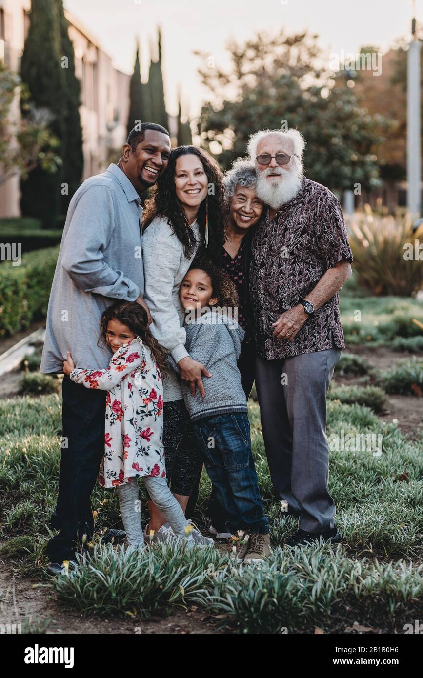 Traditional Family Portrait of Multigenerational Family Standing Stock ...