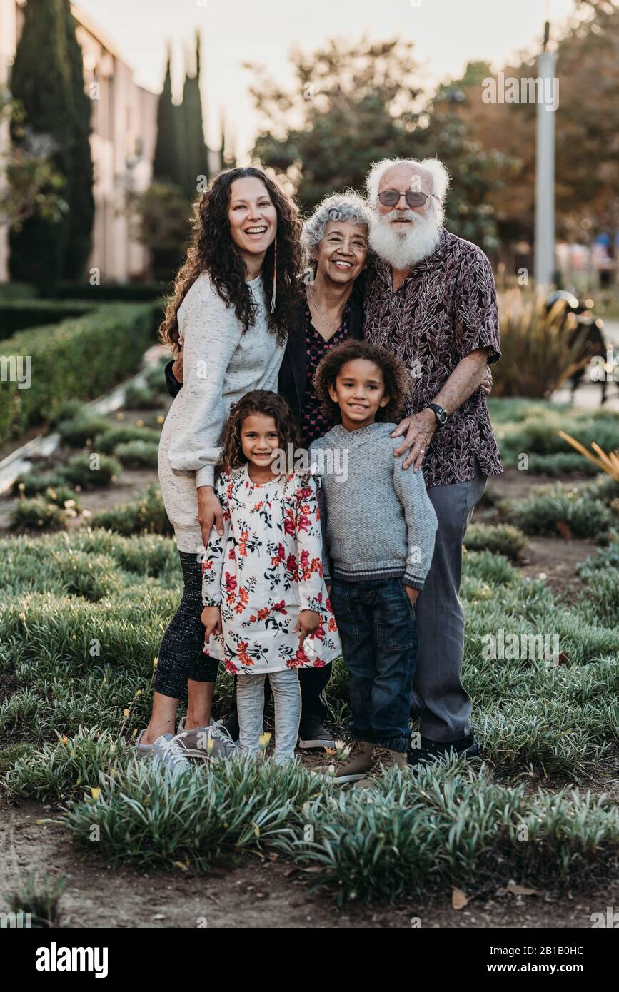 Traditional Family Portrait of Multigenerational Family Standing Stock ...