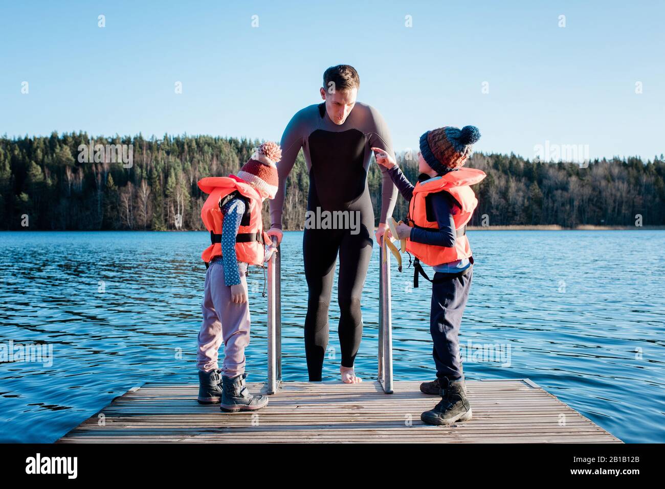 Young family going to beach hi-res stock photography and images - Alamy
