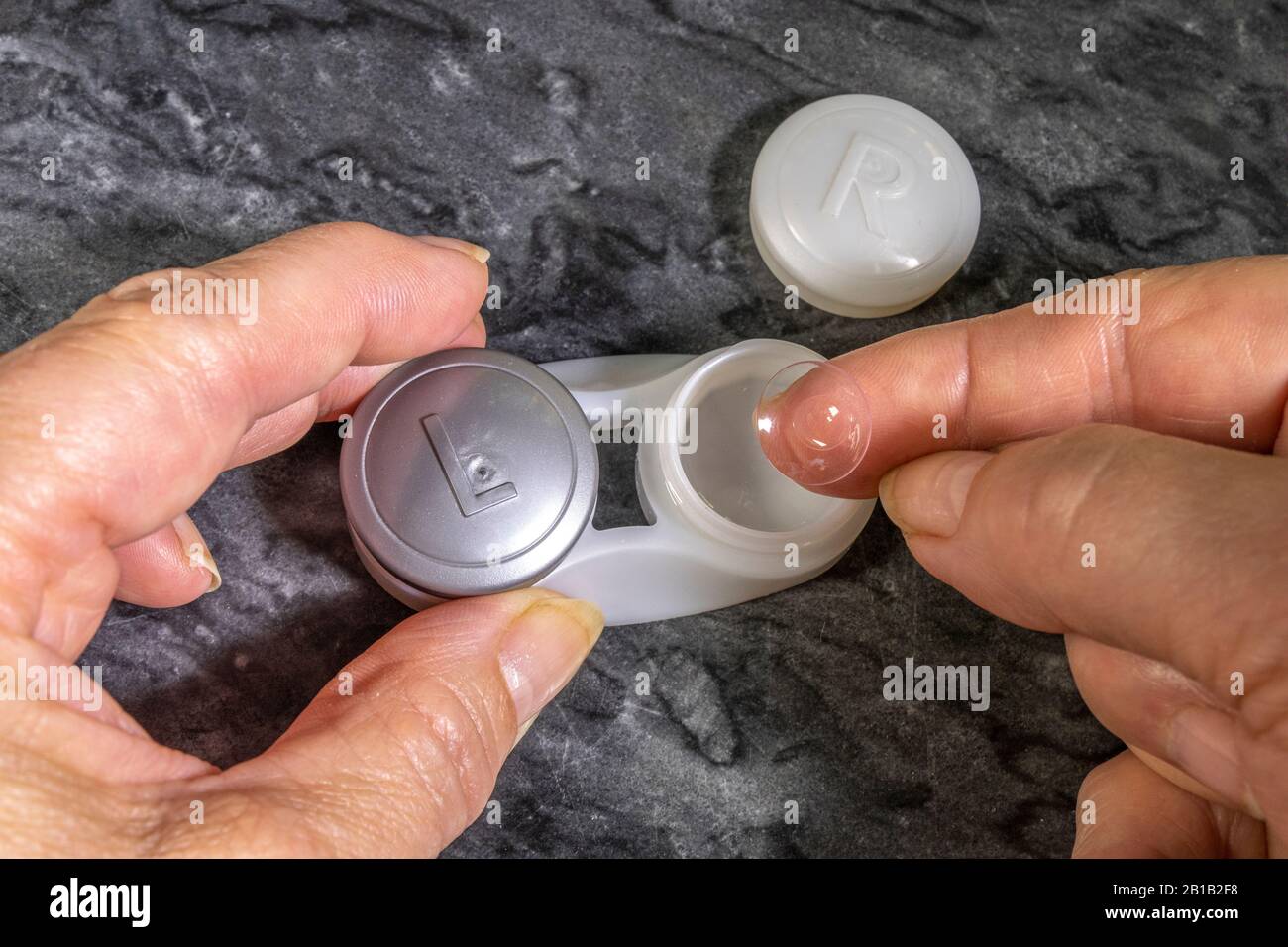 Remove contact lens hi-res stock photography and images - Alamy