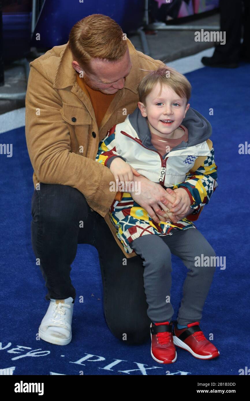 Greg Rutherford and son attending the Onward UK Premiere at the Curzon ...
