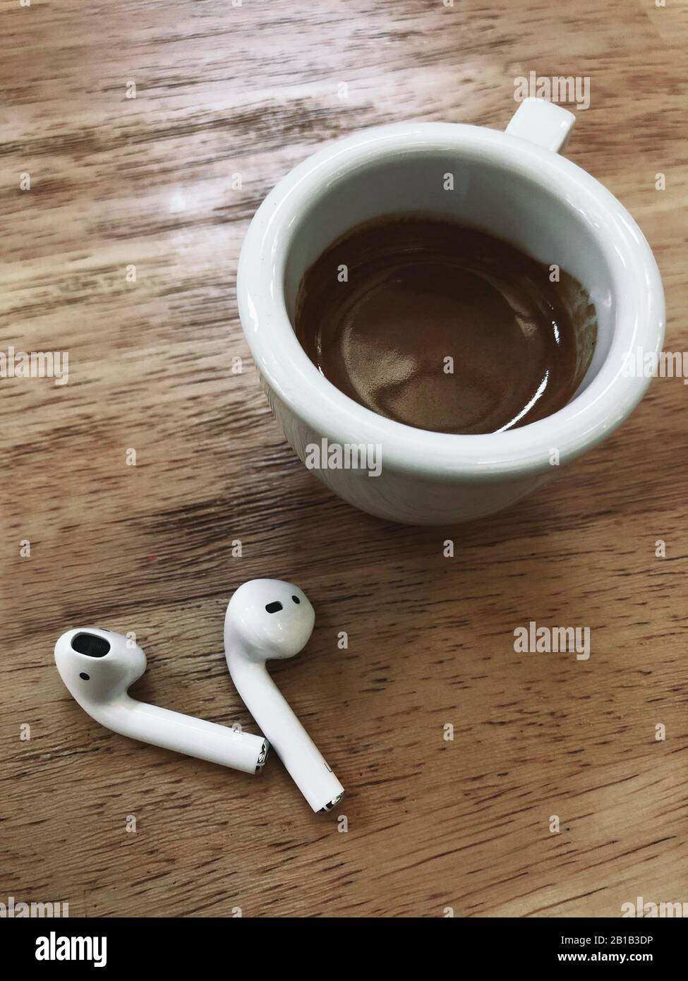 Izmir, Turkey - July 11, 2019: White colored Apple brand Airpods 2 on a ...