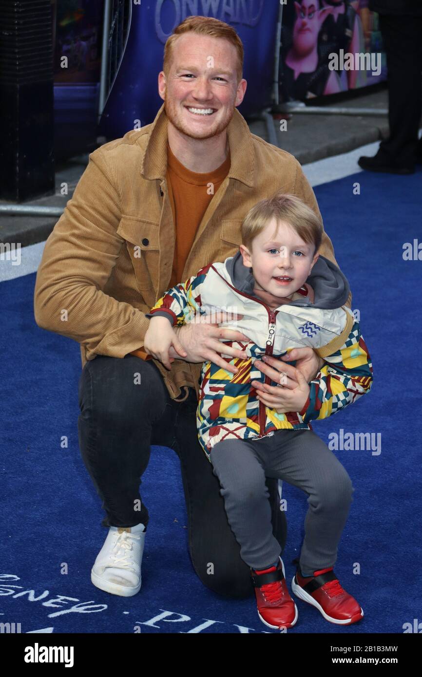 Greg Rutherford and son attending the Onward UK Premiere at the Curzon ...