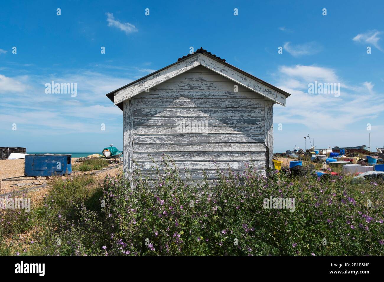 Traditional white beach huts on the beach at Walmer, Deal, Kent, UK ...