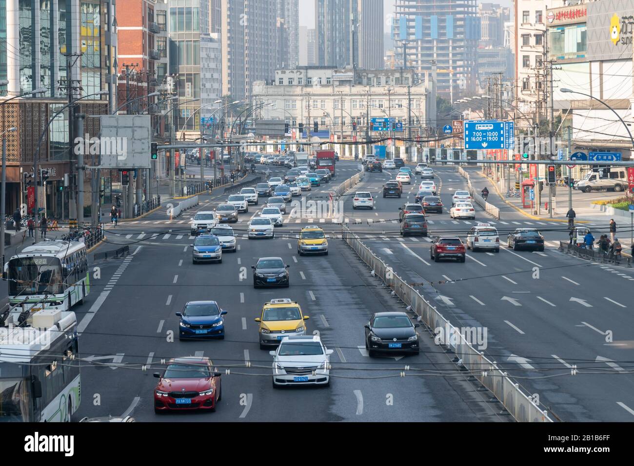 Masses of cars and buses travel on the road during rush hours in ...