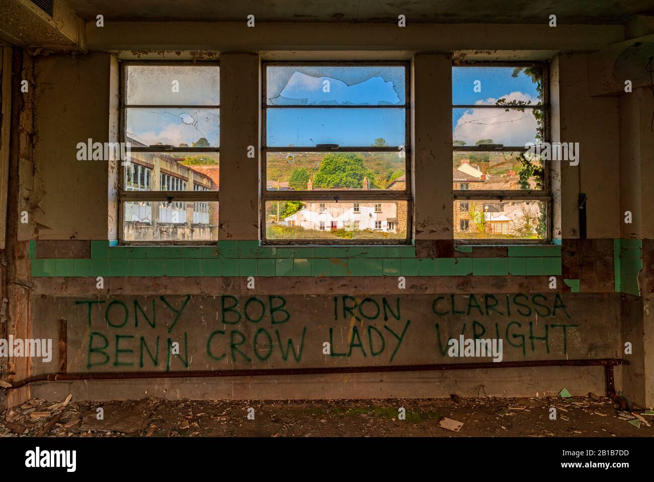 Abandoned, neglected urban buildings, with graffiti and smashed windows ...