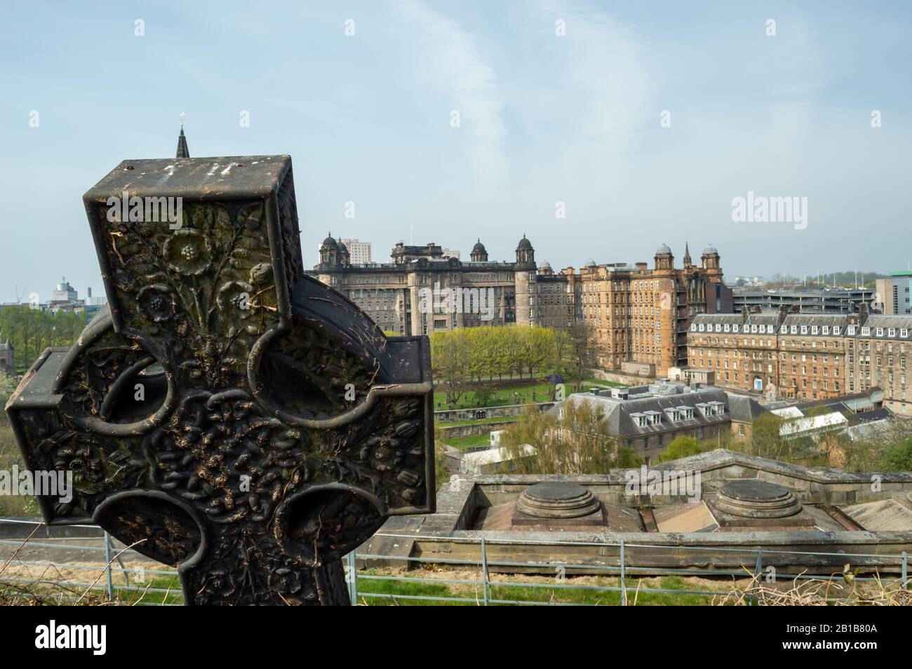 An old Celtic Cross in Glasgow Necropolis overlooking the Royal ...