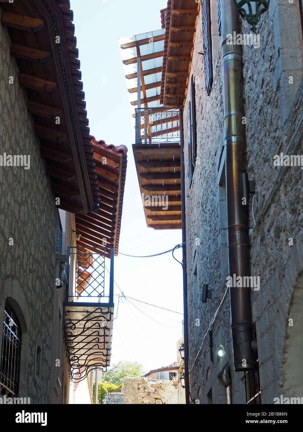 Back street and balconies on old houses in Dimitsana, Arcadia ...