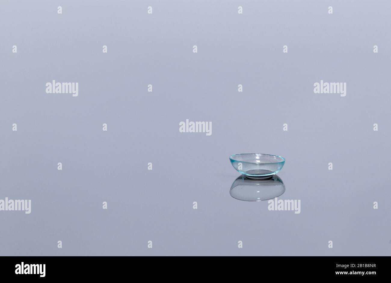 Close up single contact lens hi-res stock photography and images - Alamy