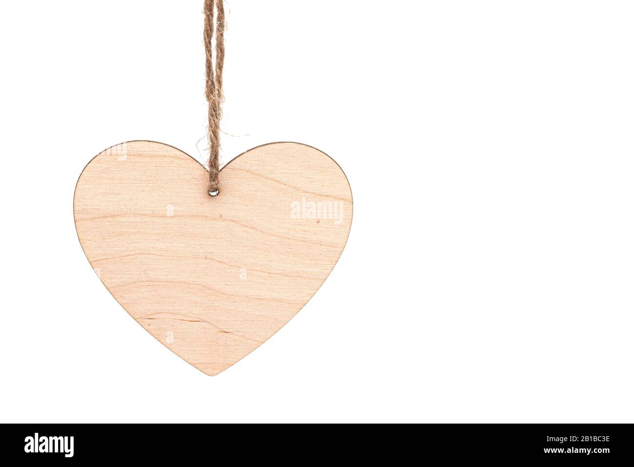Wooden Heart with Rope isolated on white Background Stock Photo - Alamy