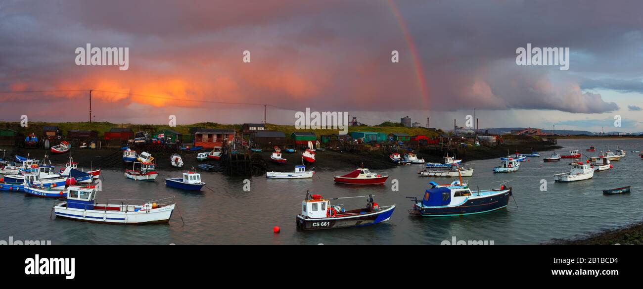 Dramatic sky and Rainbow over a small Fishing Harbour at South Gare ...