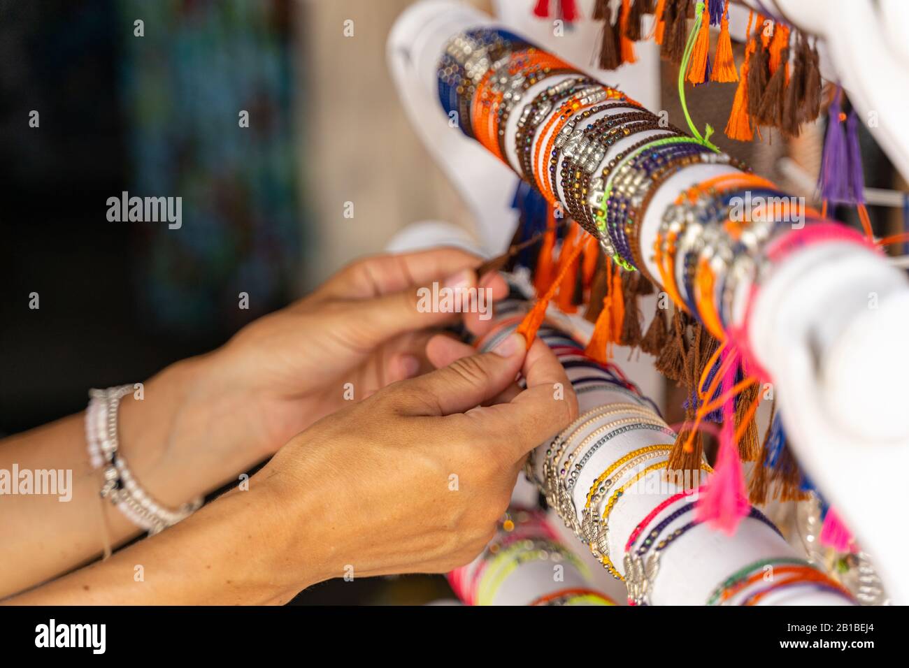 Girl purchasing local souvenirs during trip stock photo Stock Photo - Alamy