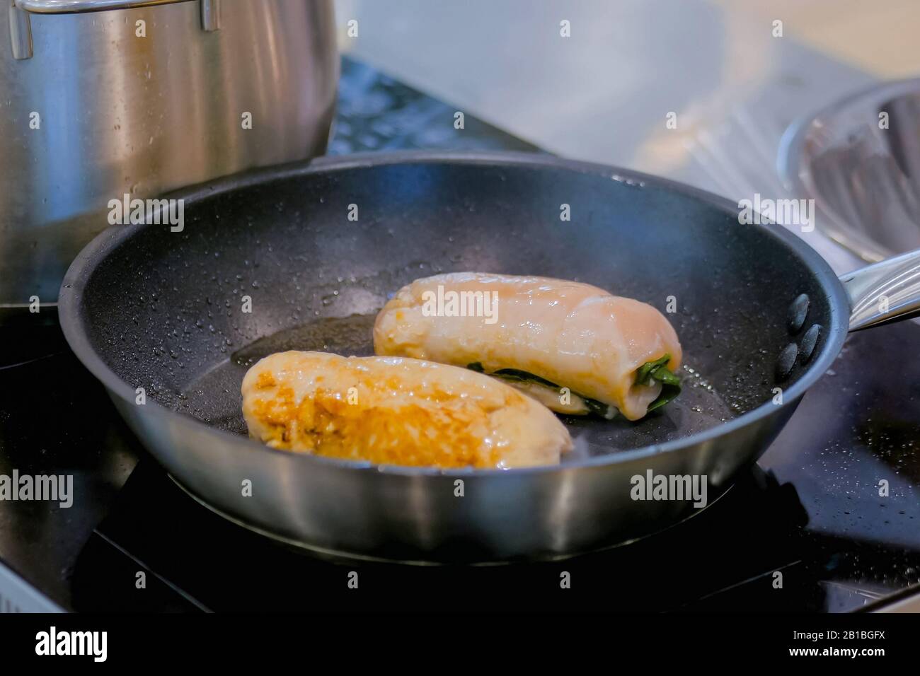 Roast stuffed chicken roll hi-res stock photography and images - Alamy