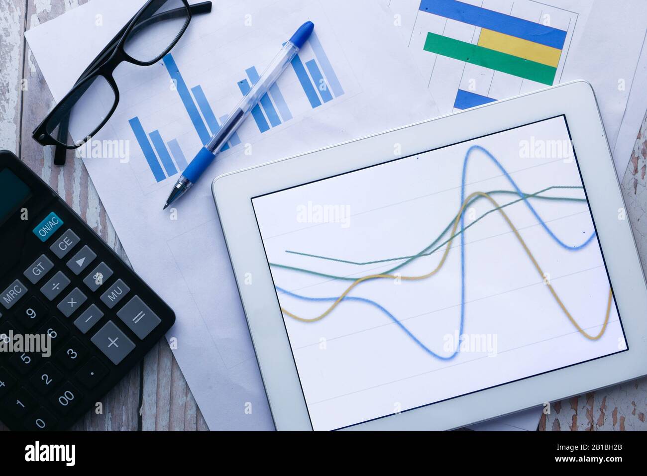 stock chart display on digital tablet on office table Stock Photo - Alamy