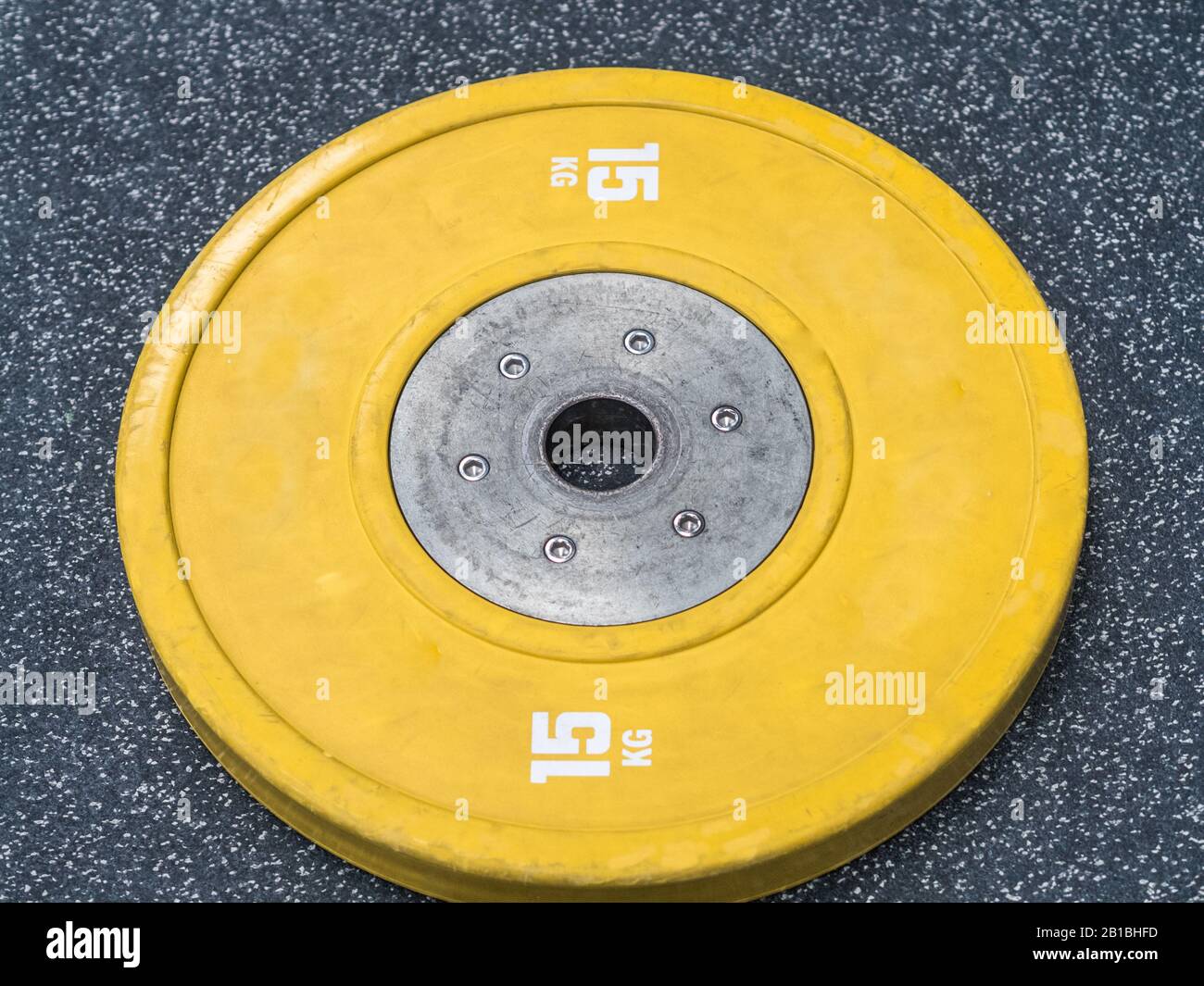 Yellow weight plate hi-res stock photography and images - Alamy