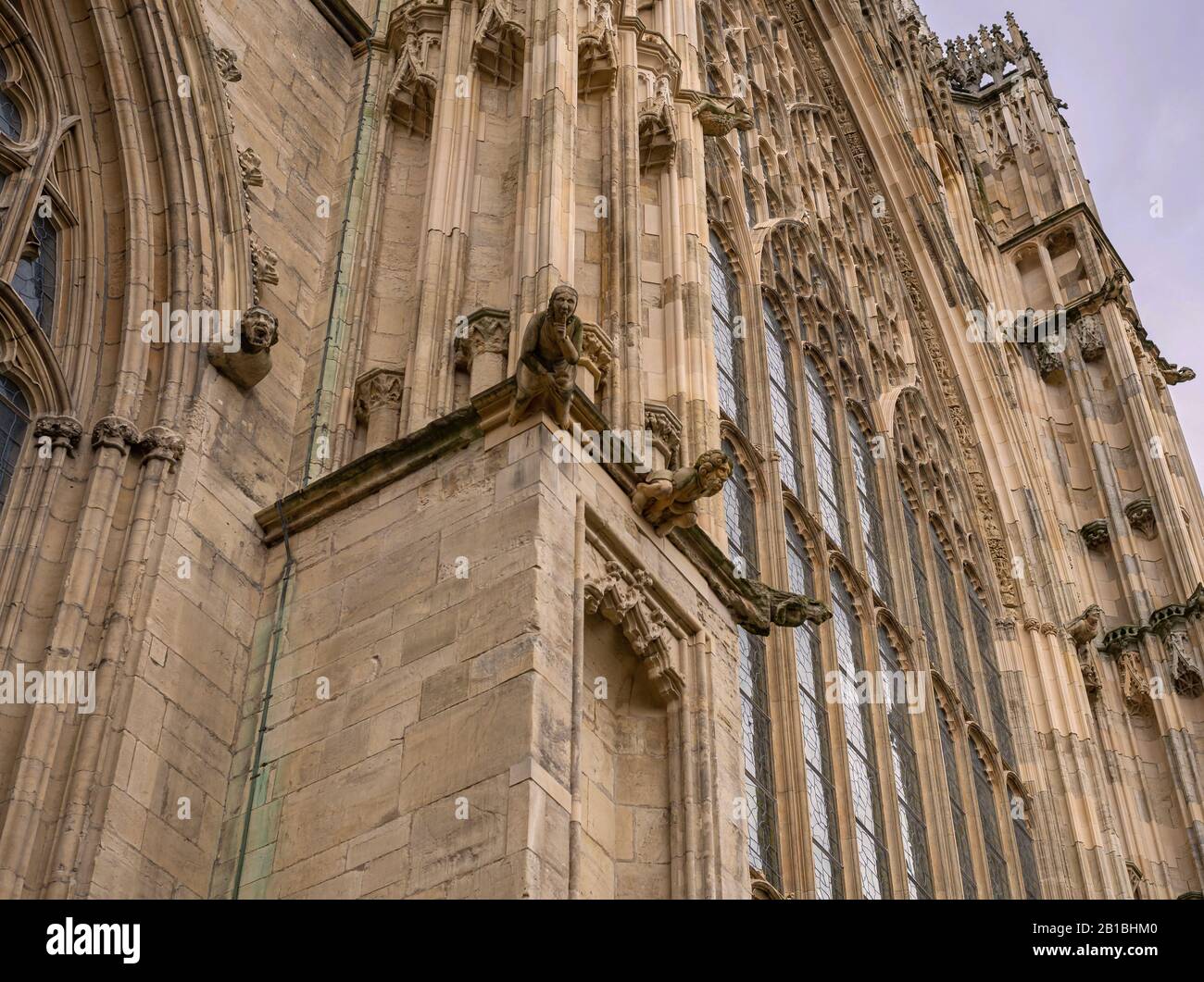 Gargoyles on the east end of York Minster. The column sits beside the ...