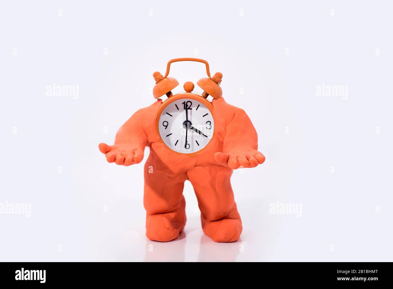 Funny ClockMan made from Play Clay. Isolated on white background Stock ...