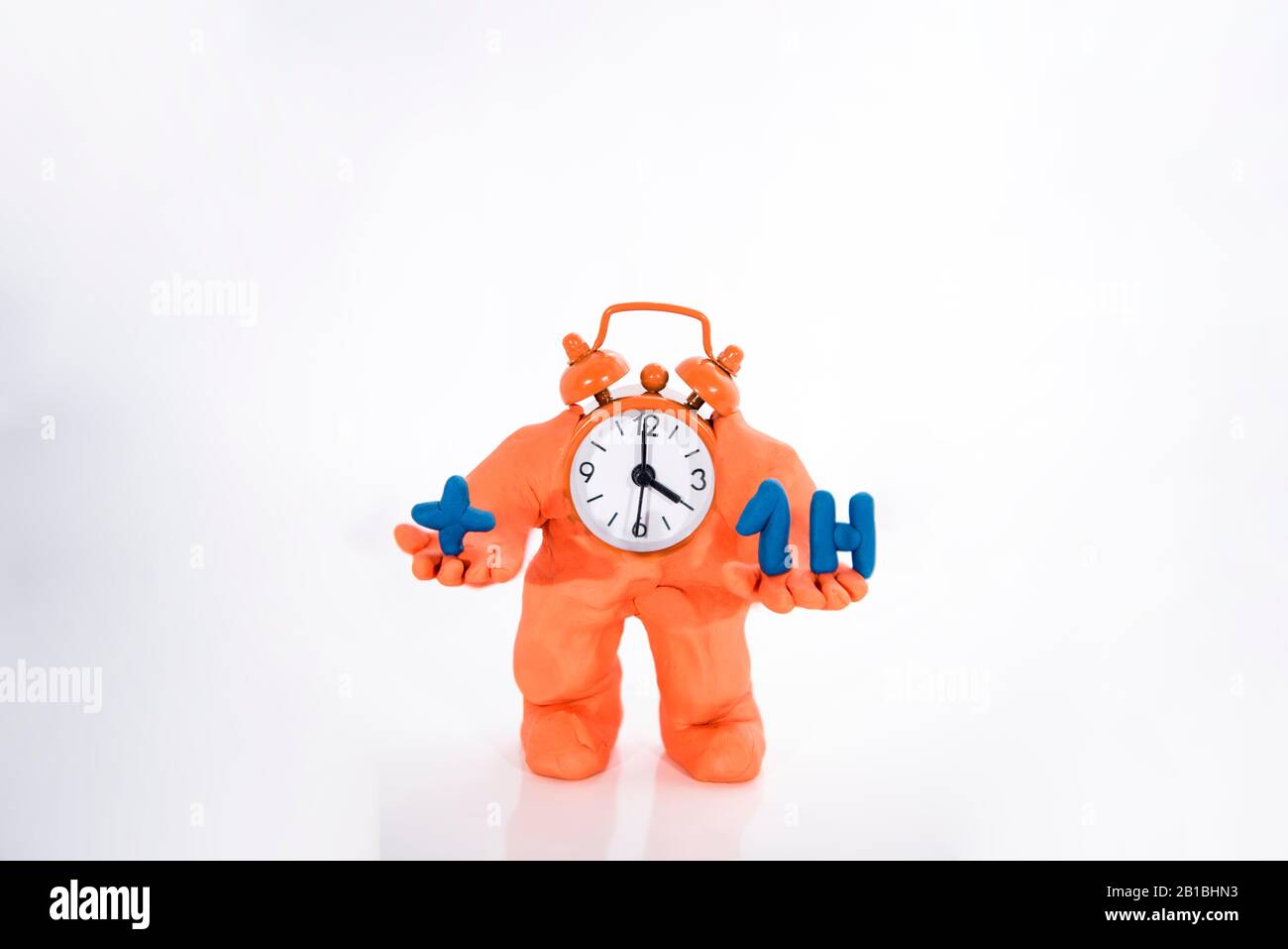 Funny ClockMan made from Play Clay. Isolated on white background Stock ...
