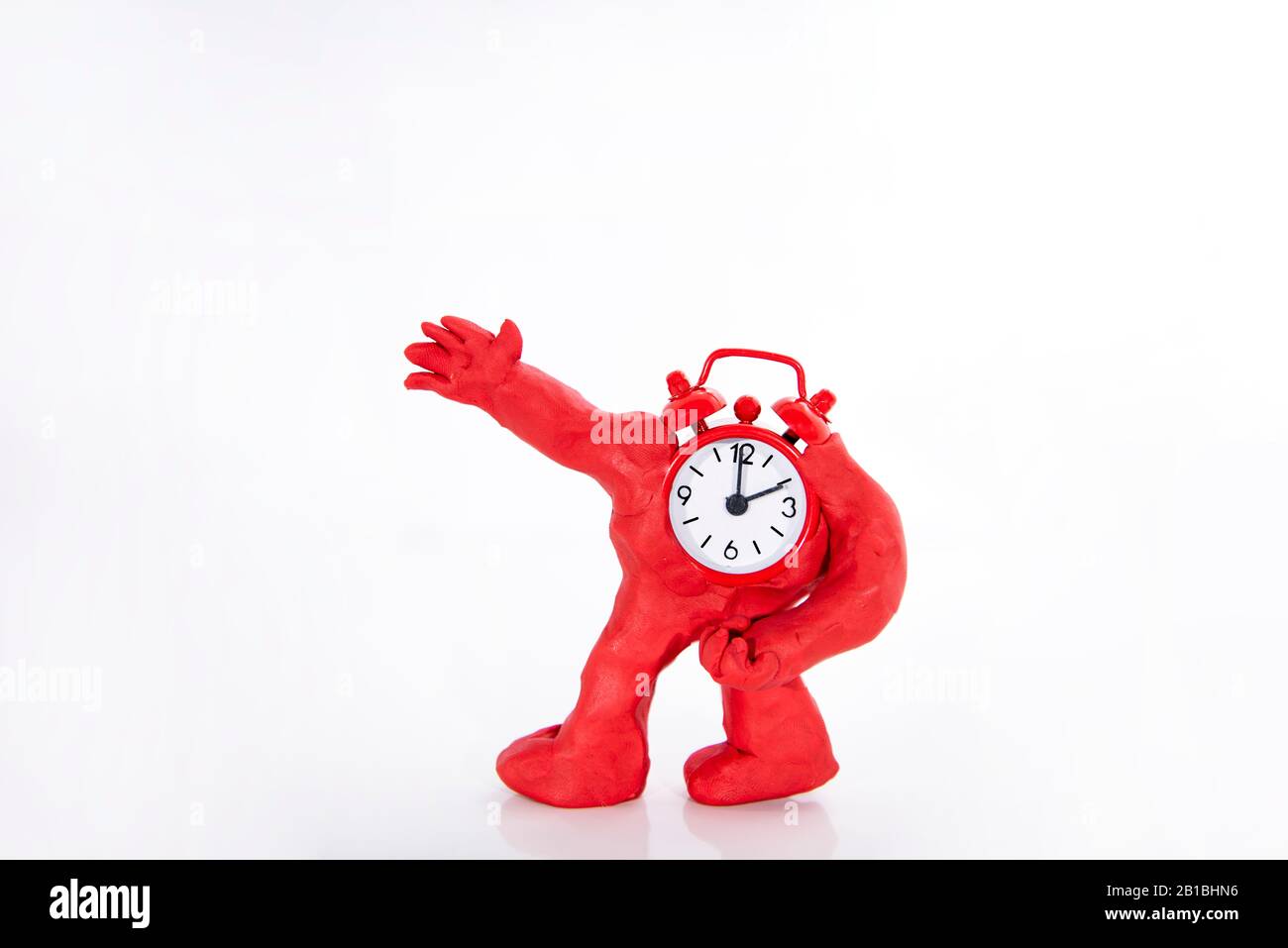 Funny ClockMan made from Play Clay. Isolated on white background Stock ...