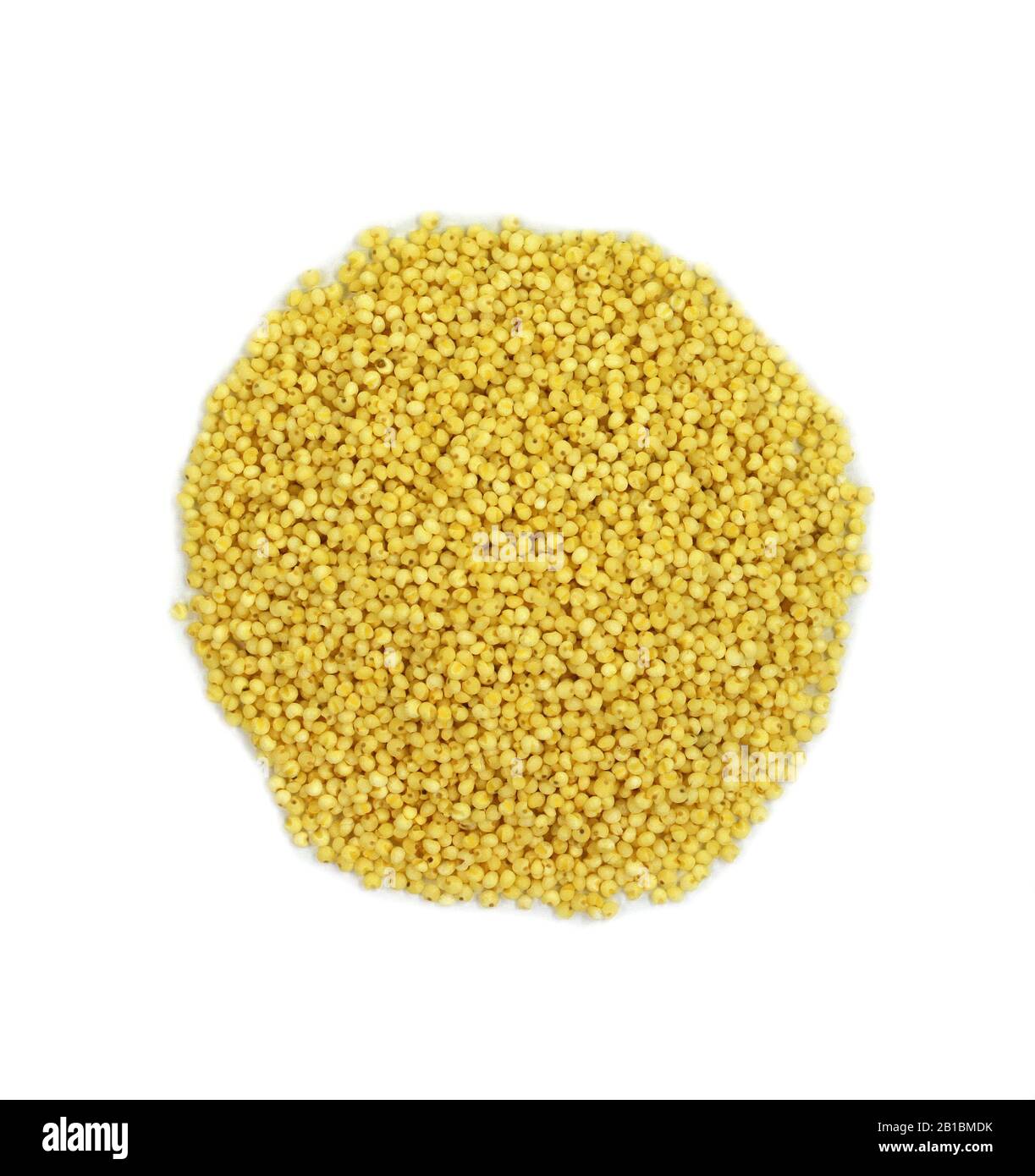 Heap of millet groats on white Stock Photo - Alamy