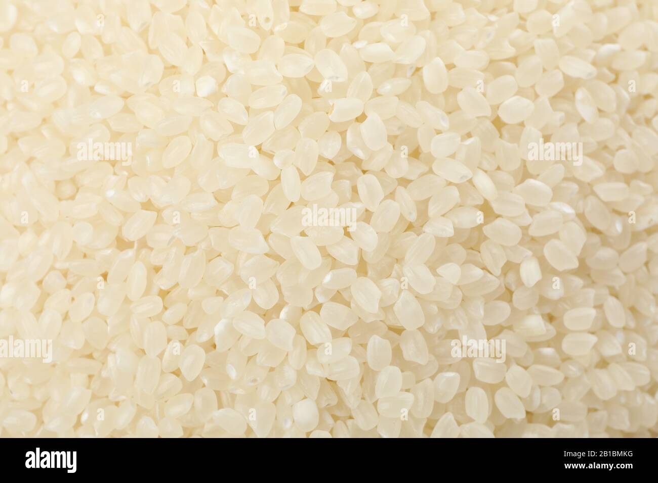 Rice texture background, close up and macro Stock Photo - Alamy