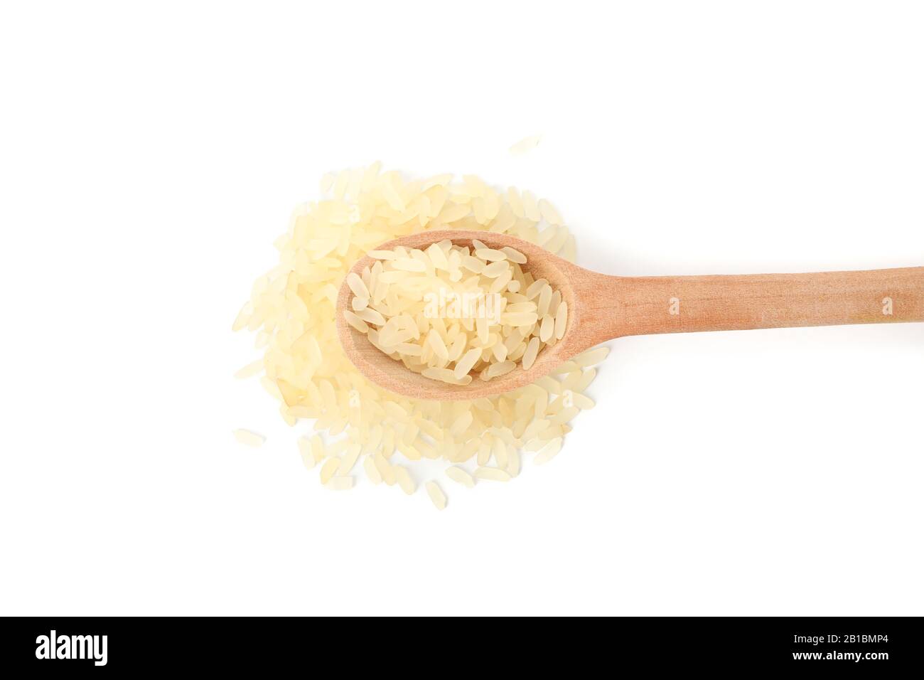 Wooden spoon with rice isolated on white background, close up Stock ...